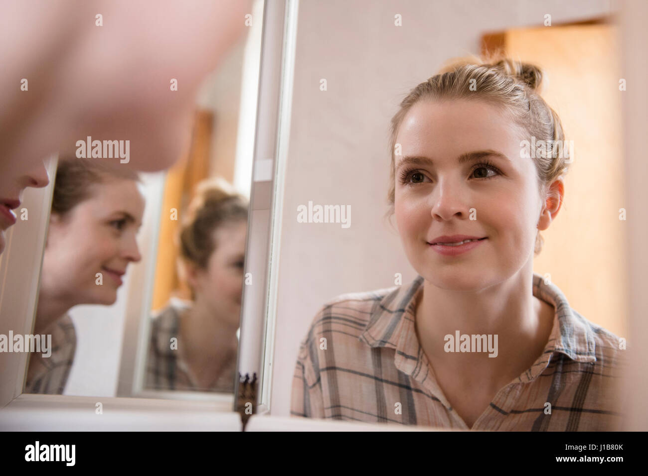 Female mirror image hi-res stock photography and images - Alamy