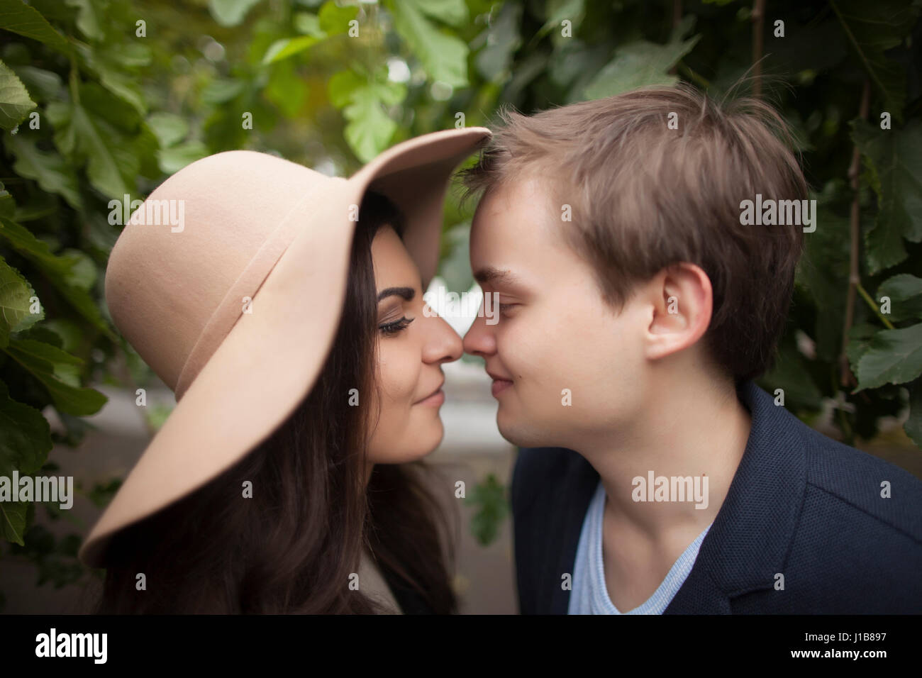 Caucasian couple rubbing noses Stock Photo - Alamy