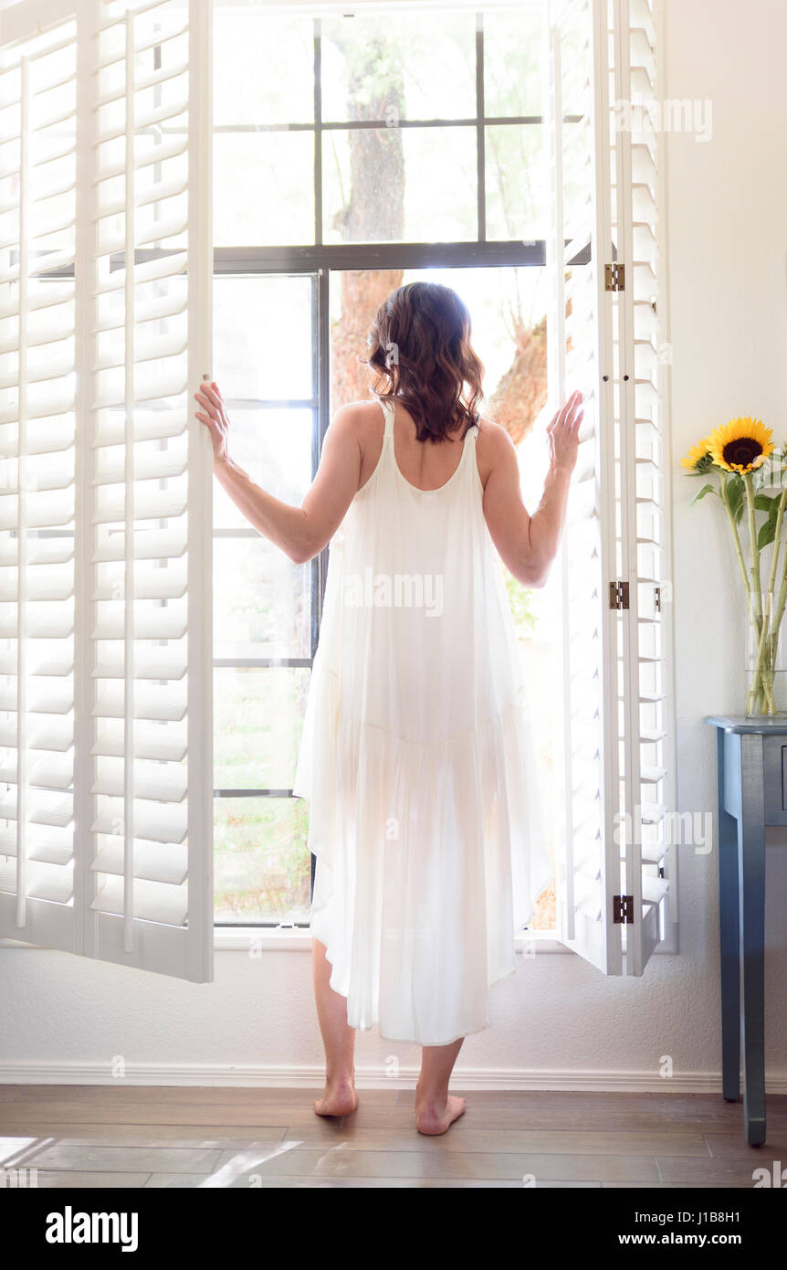 Woman wearing nightdress hi-res stock photography and images - Alamy