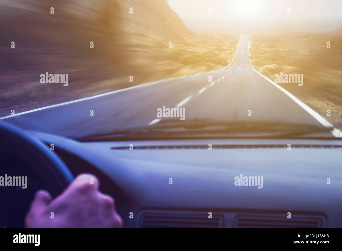 driving fast - cockpit view through front window on highway in ...