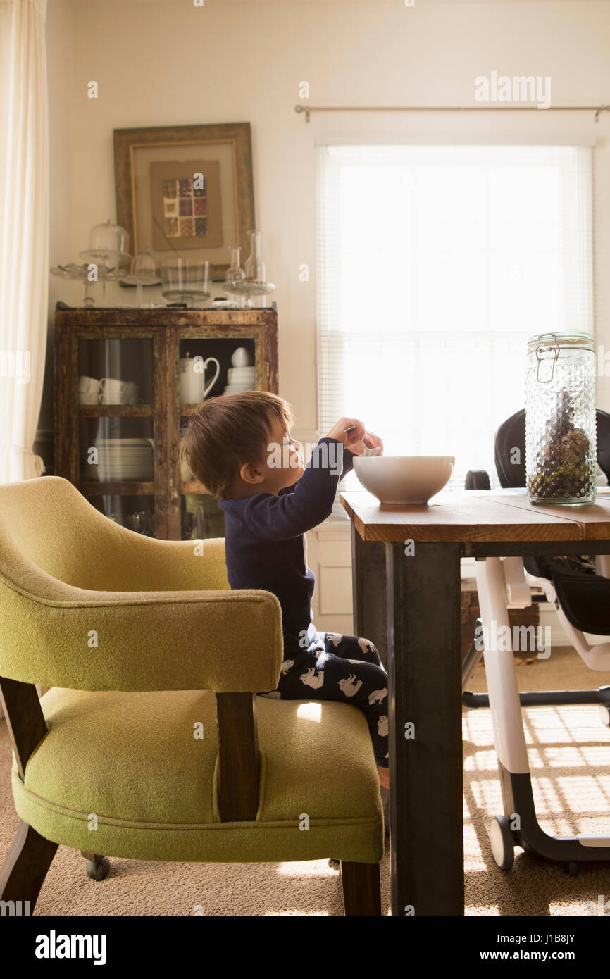 Boy 3 years eating at table hi-res stock photography and images - Alamy