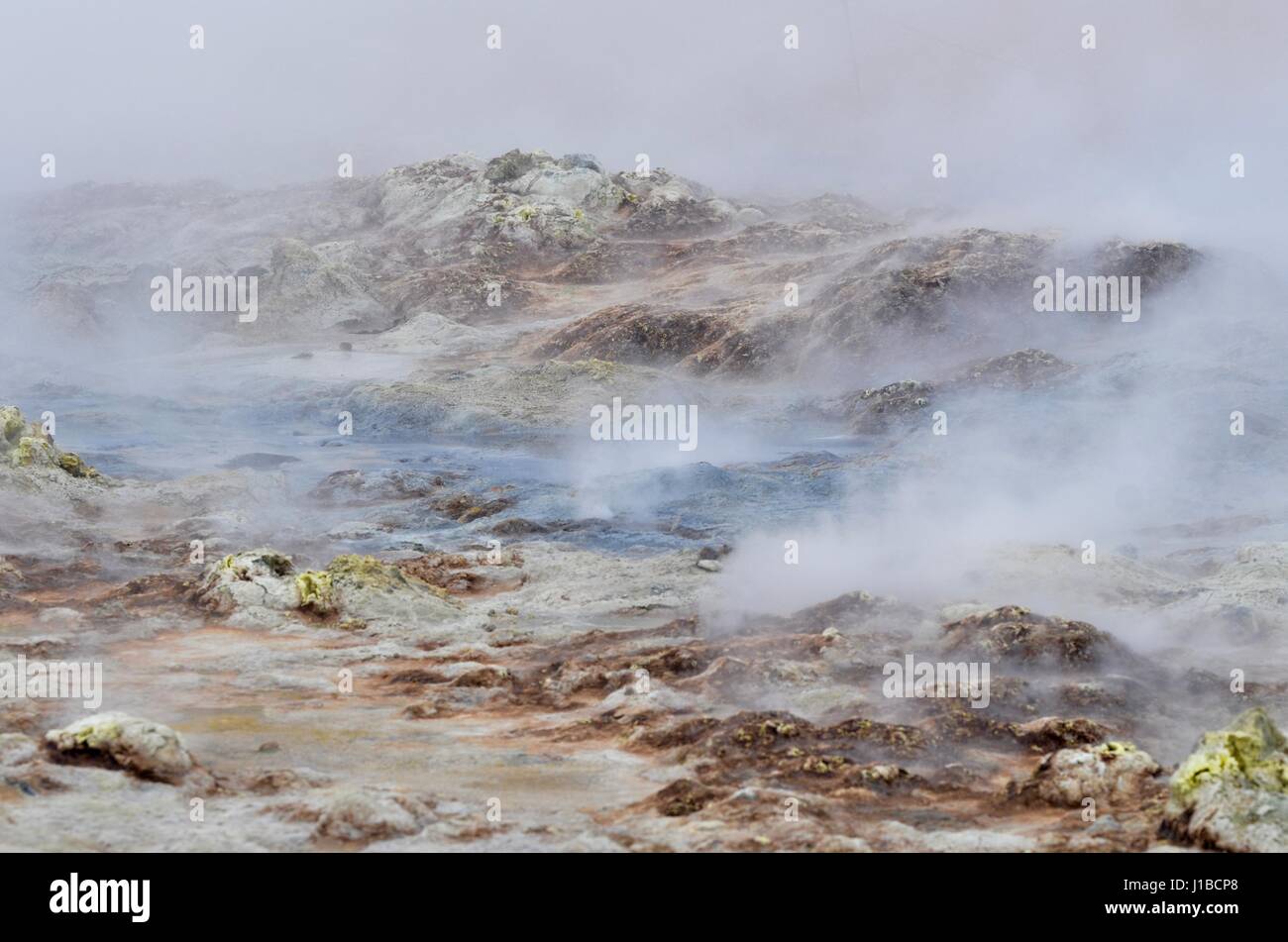 Sulfur Smokey Rocks in Iceland Stock Photo - Alamy