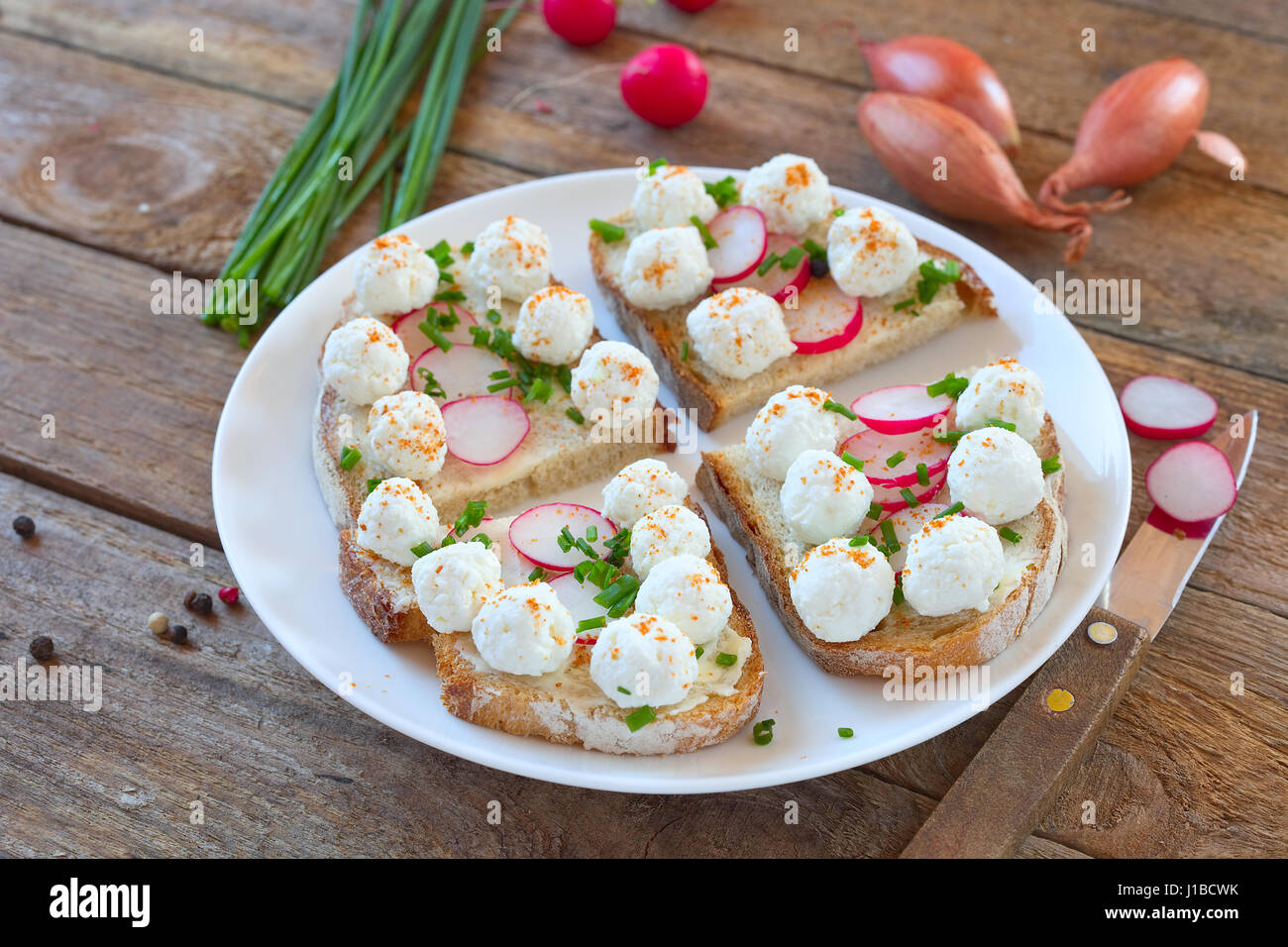 Cheese balls on a bread slices Stock Photo - Alamy