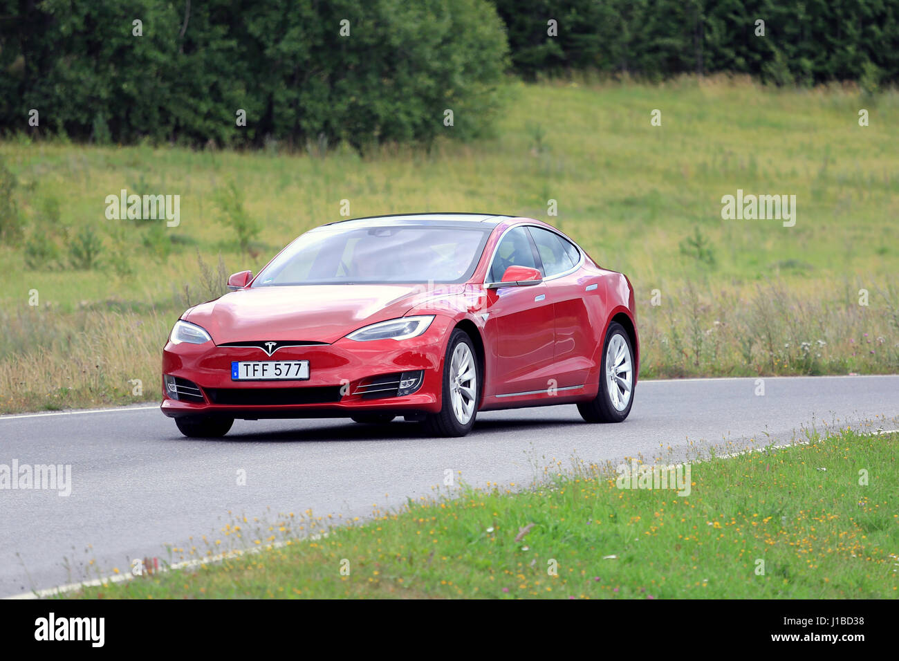 PAIMIO, FINLAND - JULY 31, 2016: Tesla Model S luxury sedan with the ...