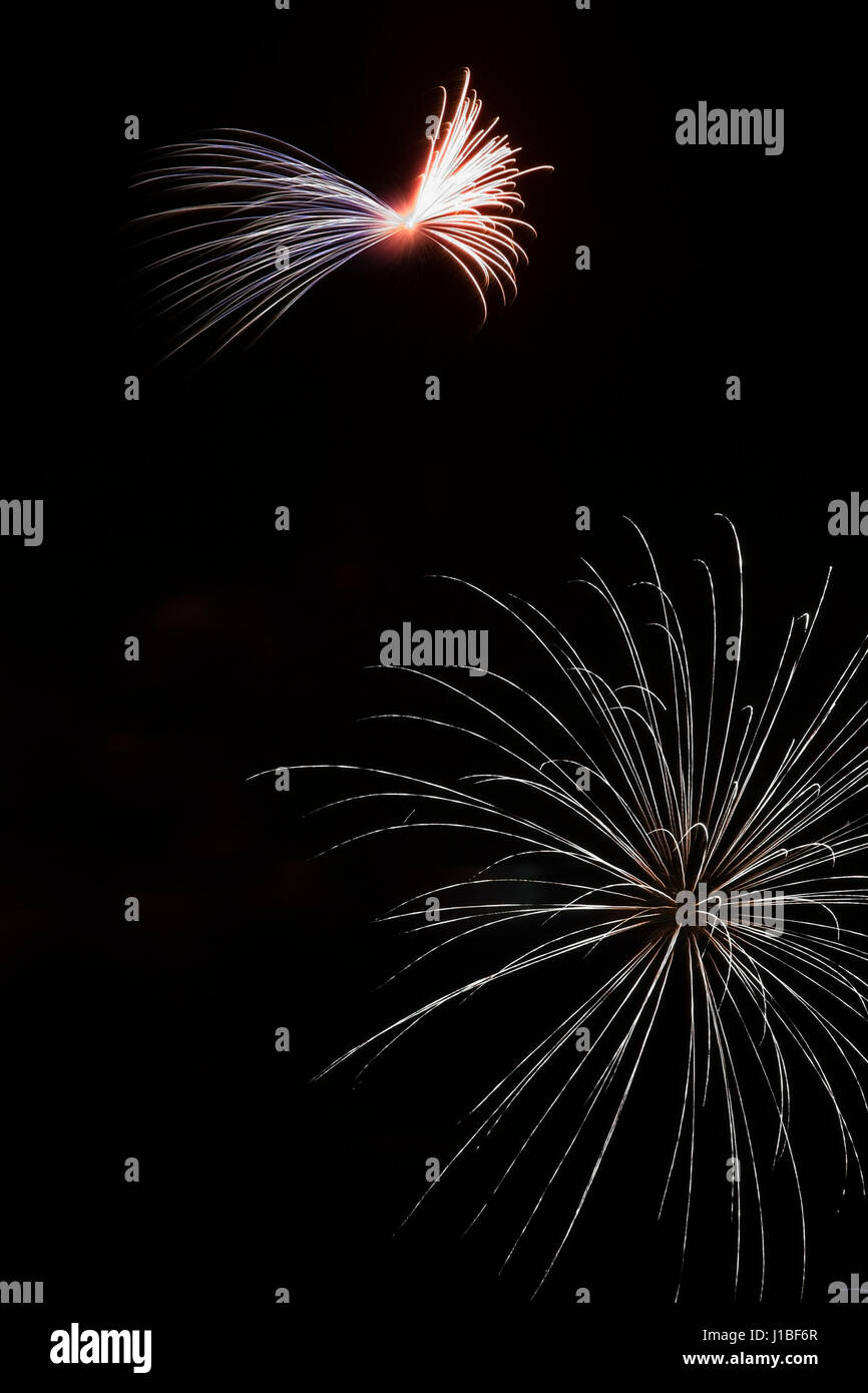 White and purplish fireworks in the night sky, La Ronde, Montreal ...