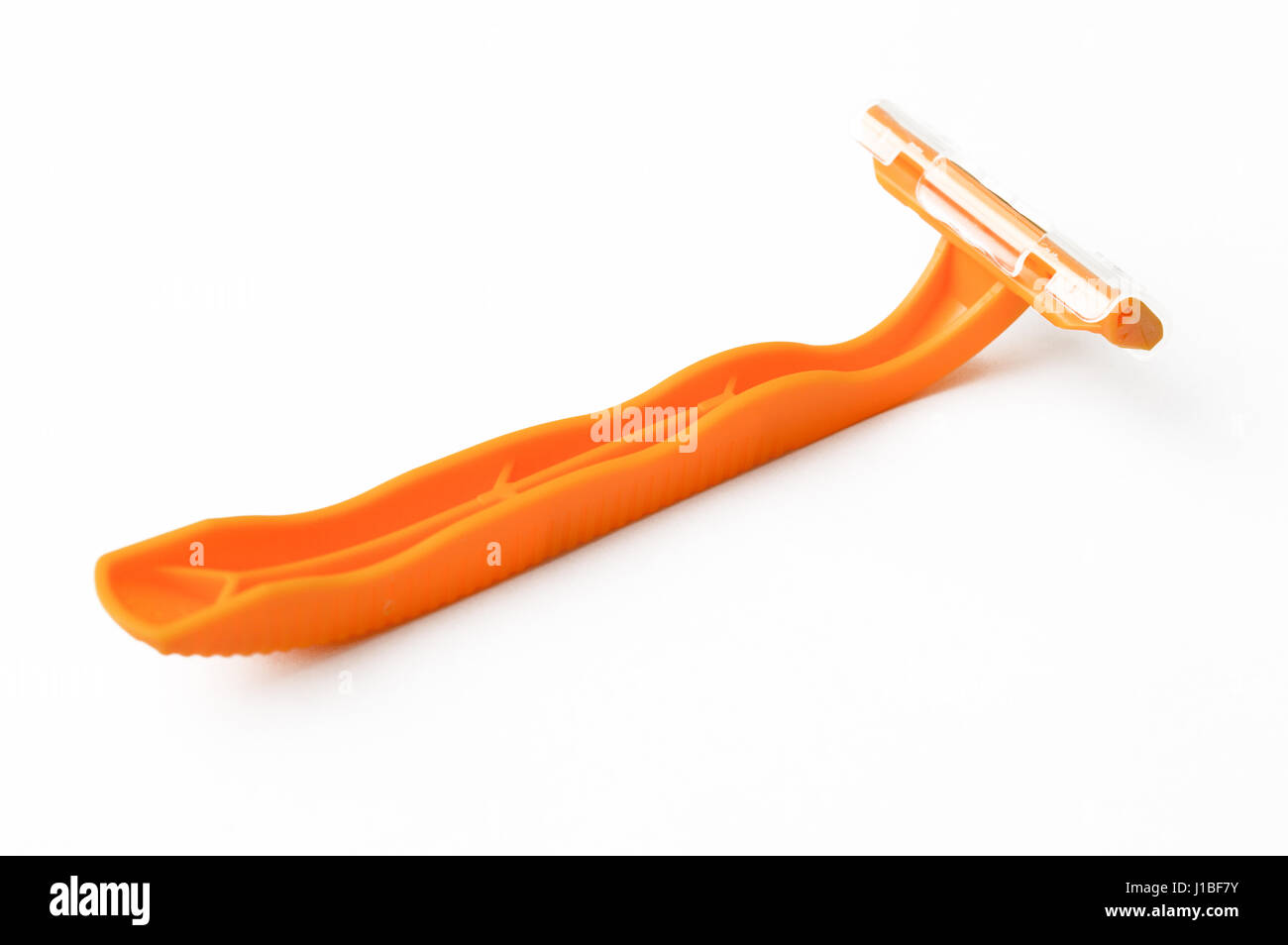 orange shaver isolated on white Stock Photo - Alamy