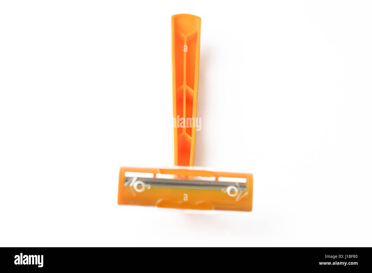 orange shaver isolated on white Stock Photo - Alamy