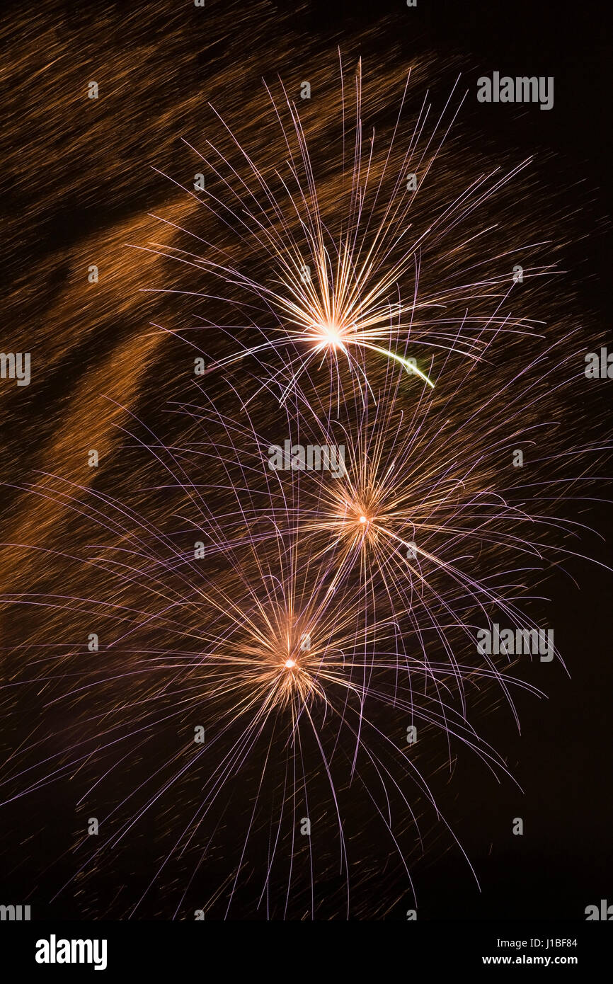 Gold and white fireworks in the night sky, La Ronde, Montreal, Quebec ...