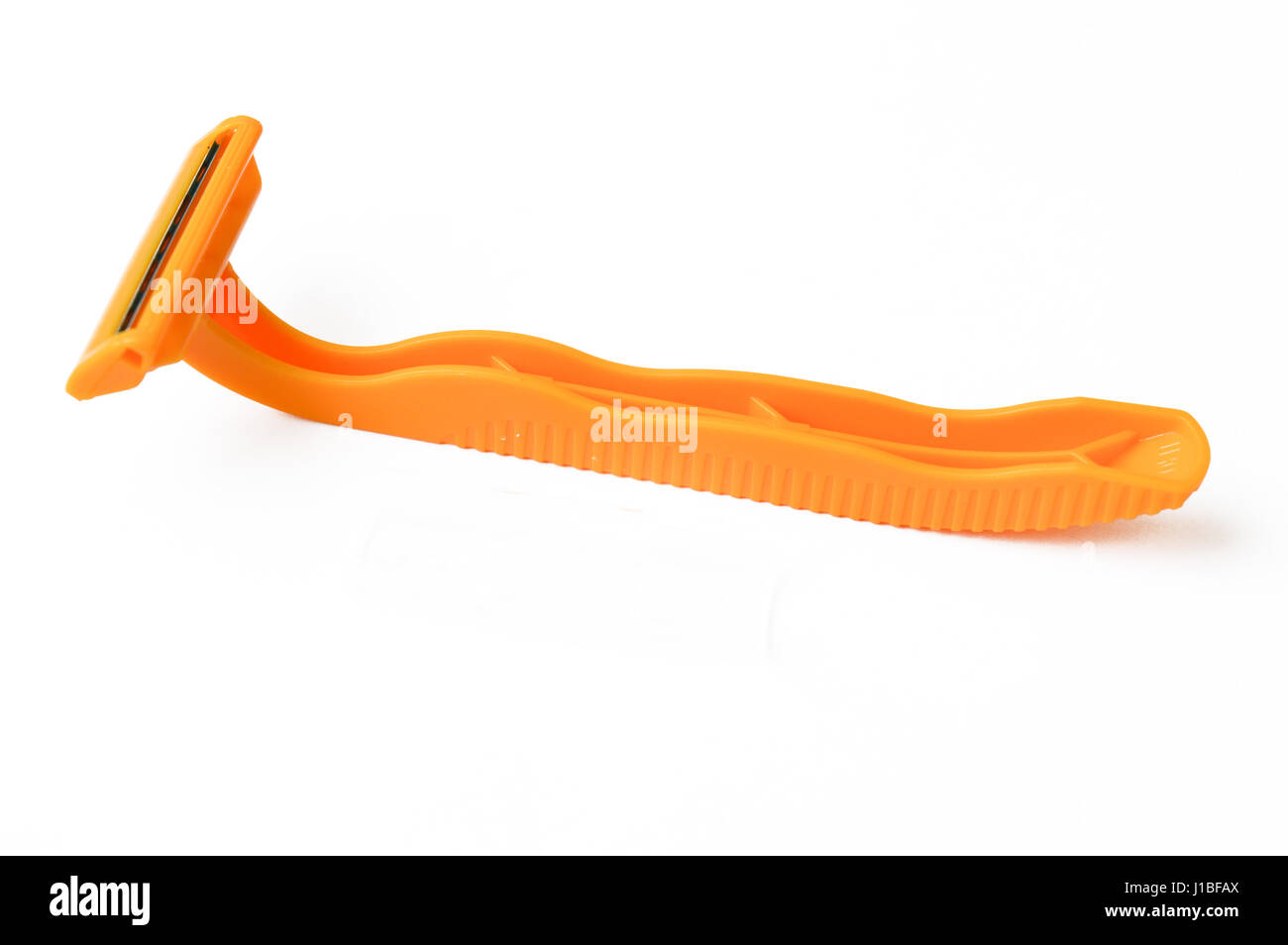 orange shaver isolated on white Stock Photo - Alamy