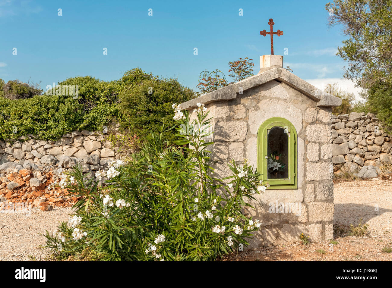 Small stone shrine in Lun, Pag island, Croatia Stock Photo - Alamy