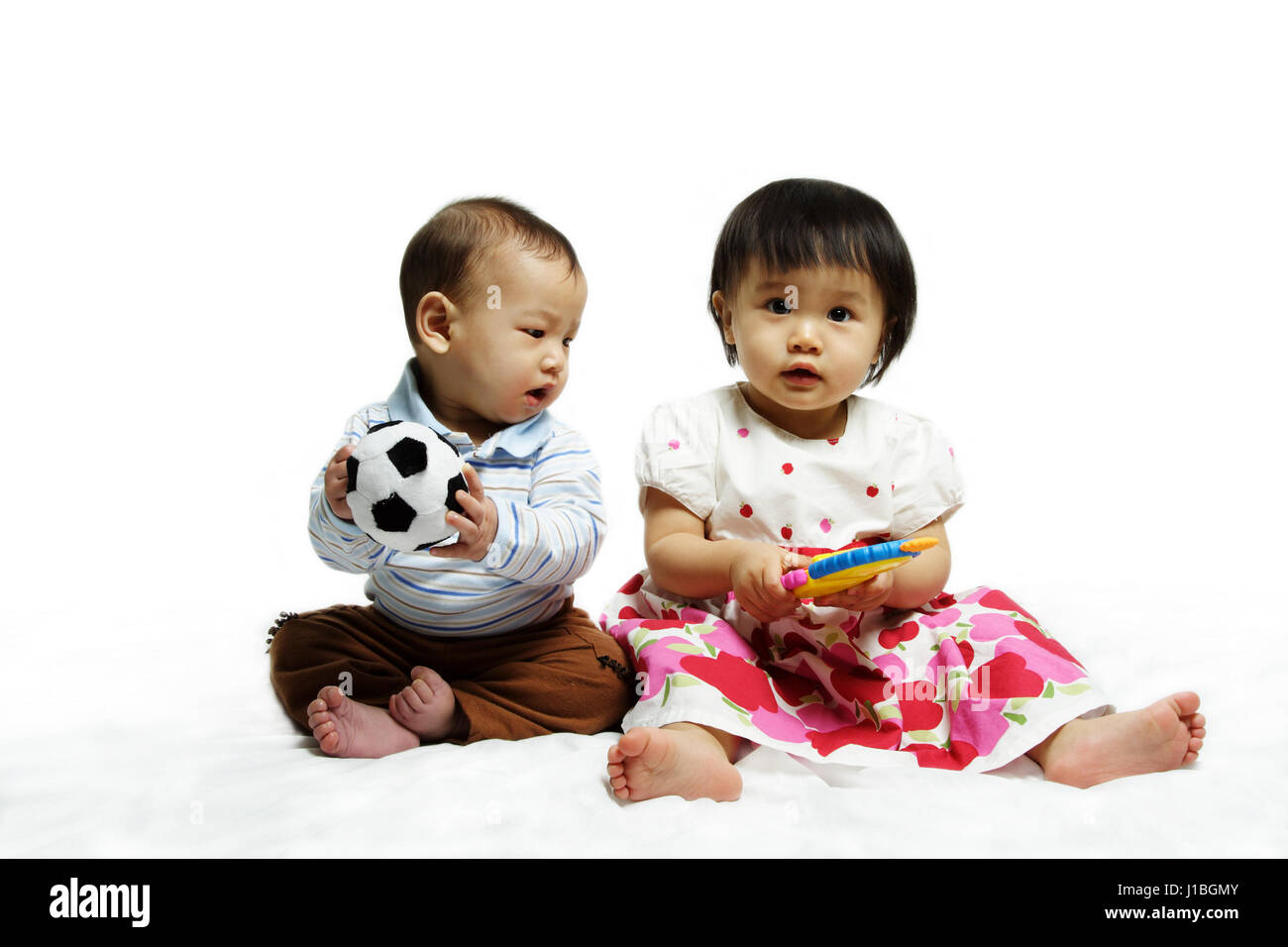 A portrait of two children playing together Stock Photo - Alamy
