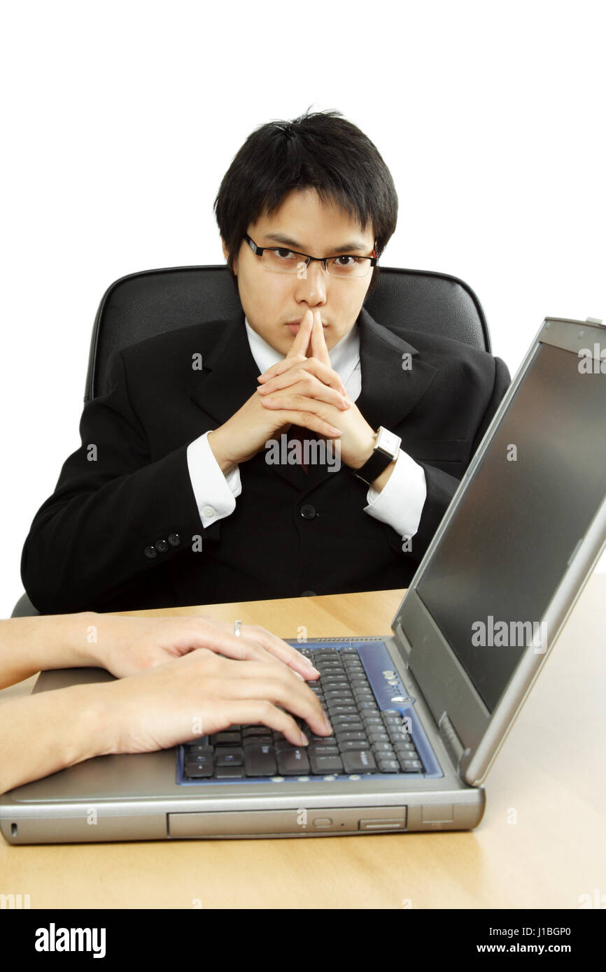 A businessman thinking during a business meeting Stock Photo - Alamy