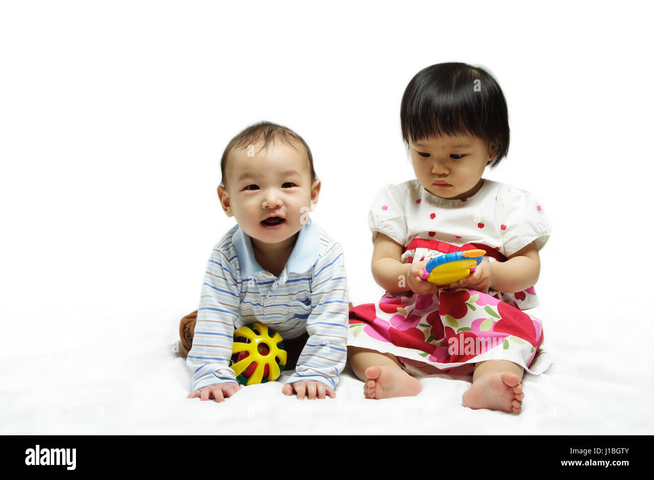 A portrait of two children playing together Stock Photo - Alamy