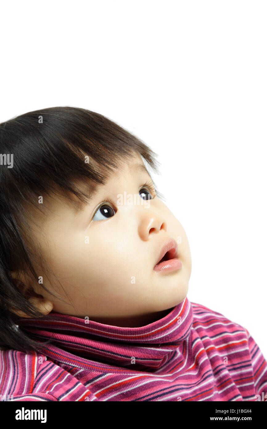 A portrait of a baby girl looking up (isolated Stock Photo - Alamy