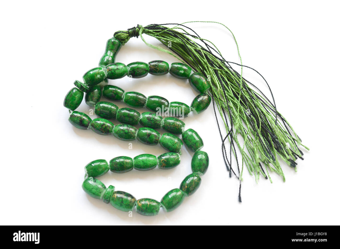 green beads isolated on white Stock Photo - Alamy
