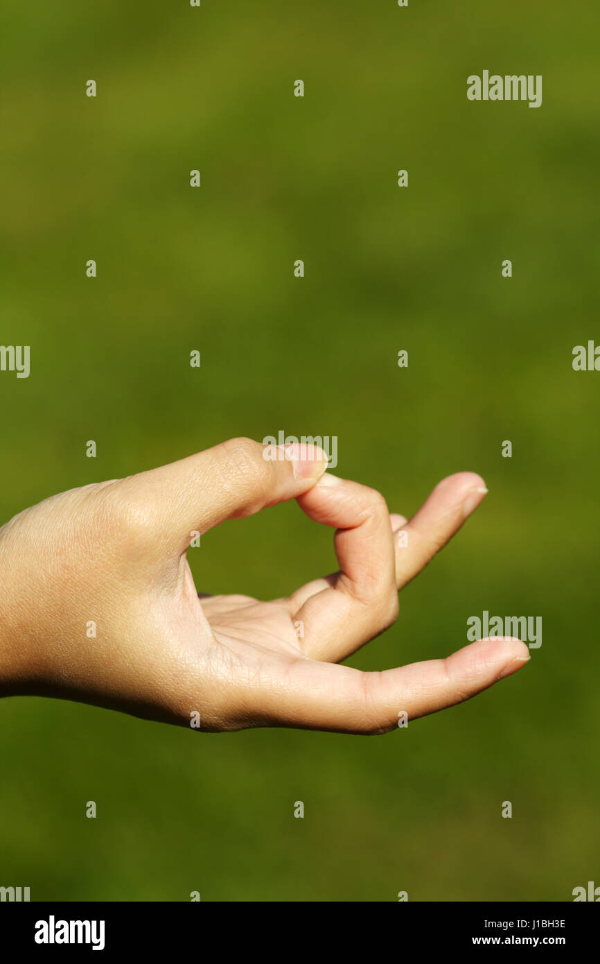 A hand with fingers ini meditation/yoga position Stock Photo - Alamy