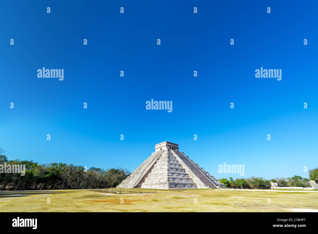 Wide angle view of the pyramid in the Mayan ruins of Chichen Itza in ...