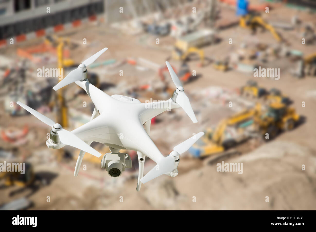 Unmanned Aircraft System (UAV) Quadcopter Drone In The Air Over ...