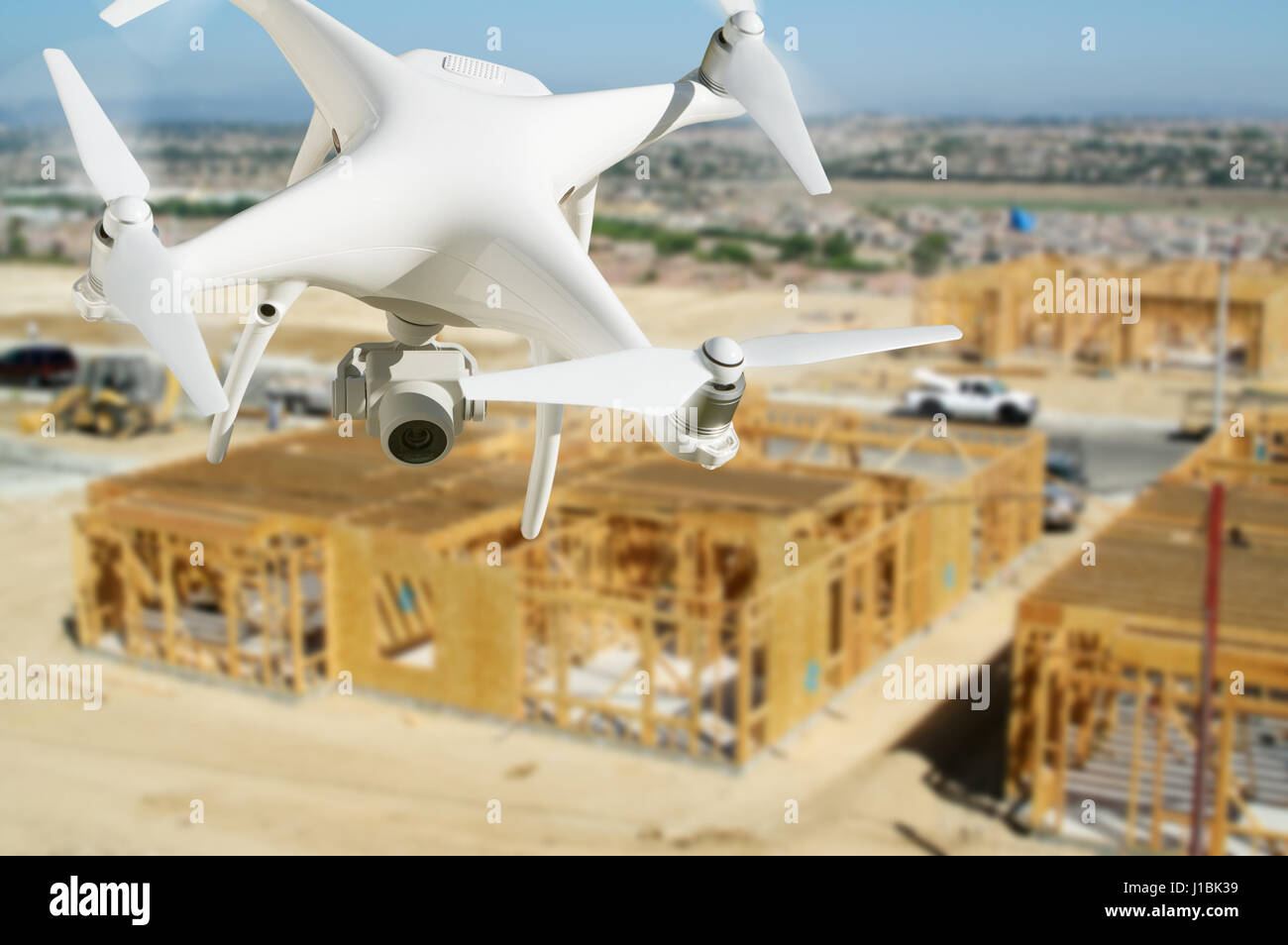 Unmanned Aircraft System (UAV) Quadcopter Drone In The Air Over ...