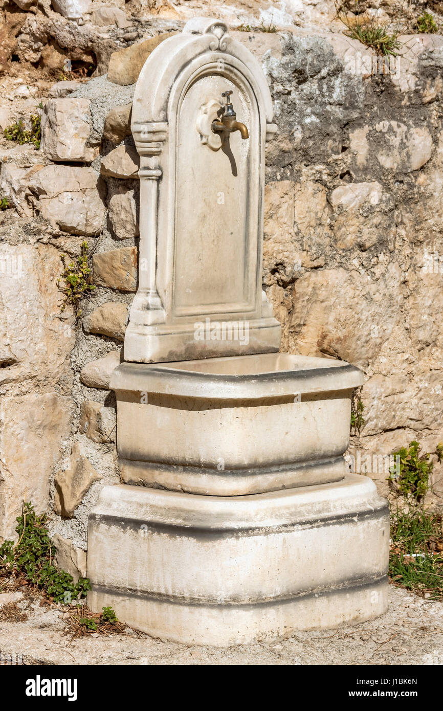 Water tap in old Pag town (Stari grad), Pag island, Croatia Stock Photo ...