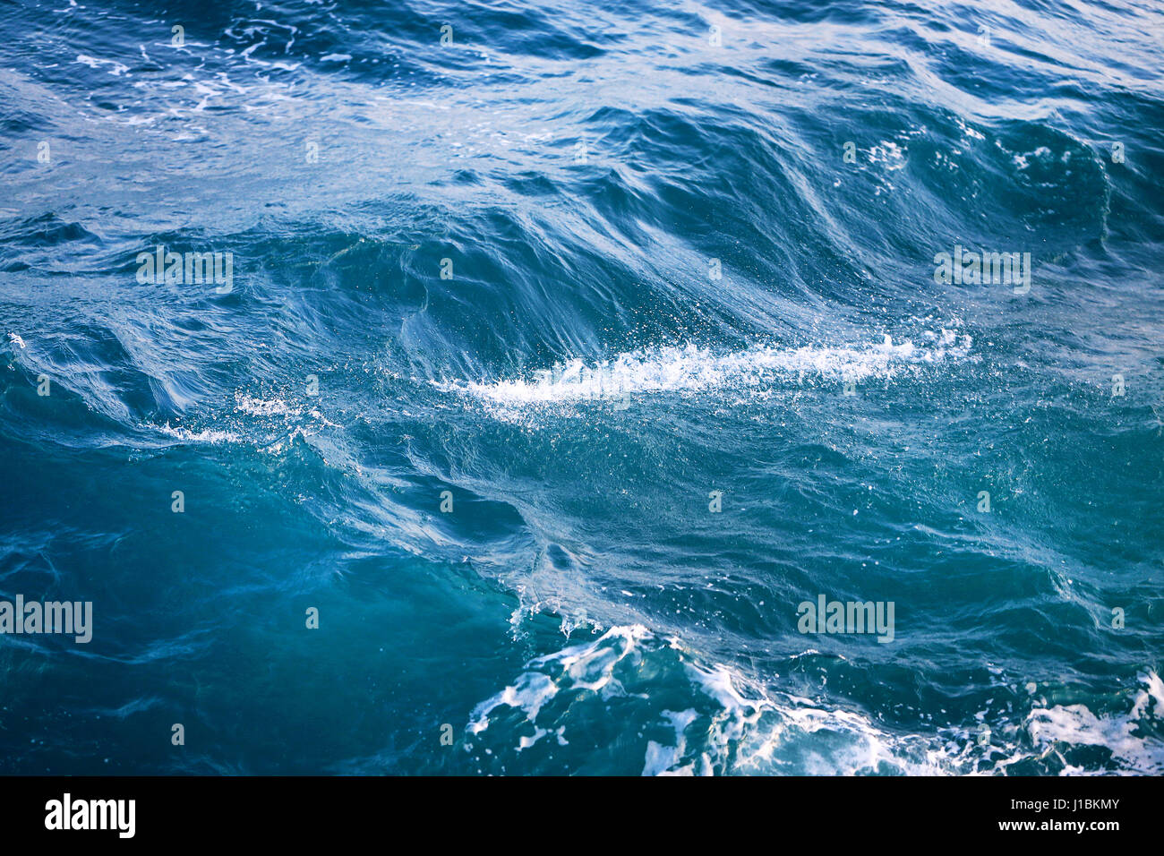 Photo background beautiful blue clean sea with waves Stock Photo - Alamy