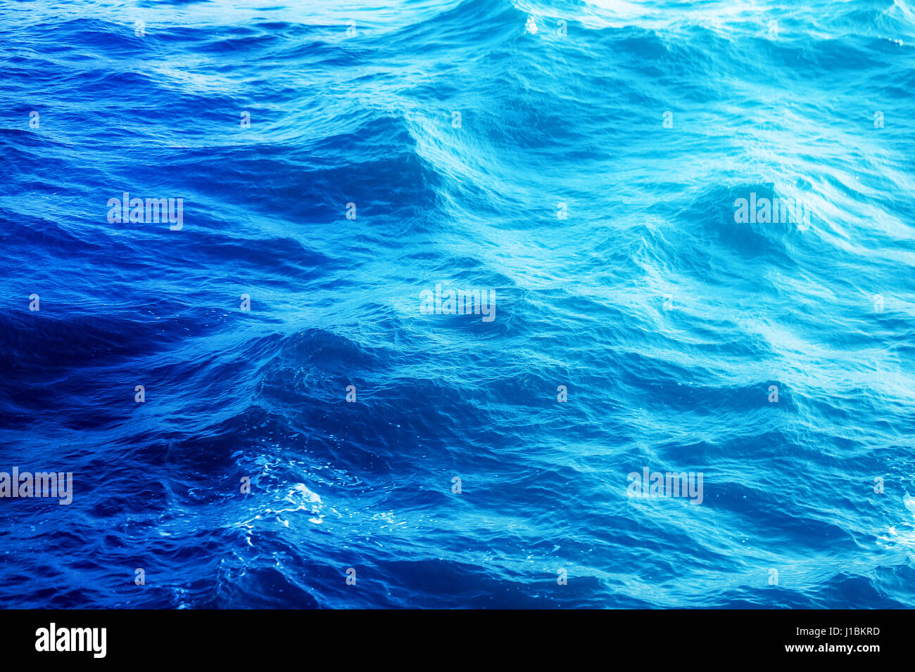 Photo background beautiful blue clean sea with waves Stock Photo - Alamy