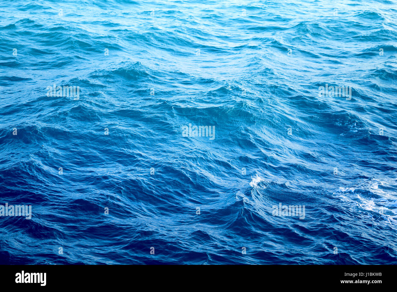 Photo background beautiful blue clean sea with waves Stock Photo - Alamy