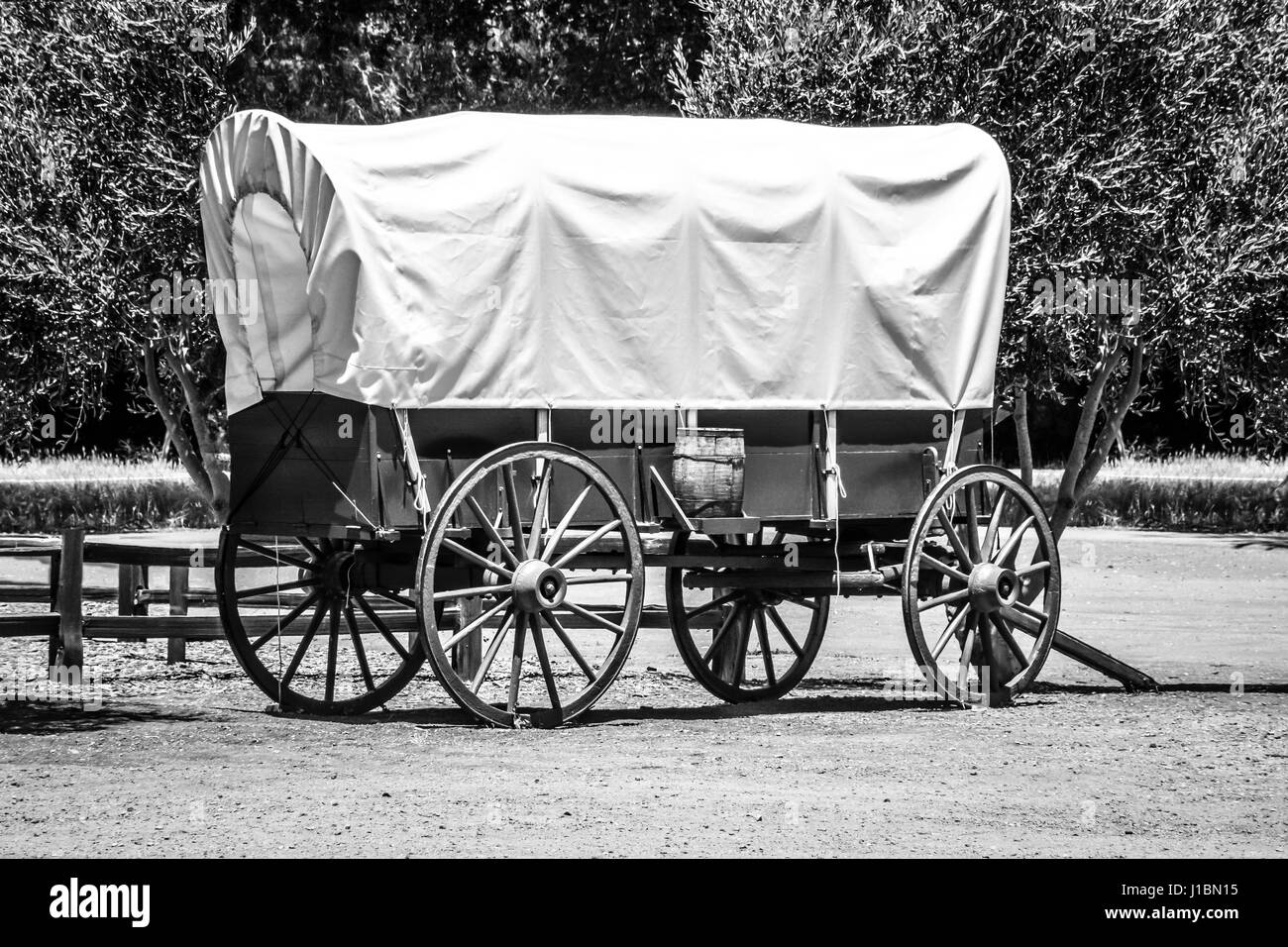 A nostalgic view of an old Colonial times covered wagon used to settle ... A nostalgic view of an old Colonial times covered wagon used to settle ...