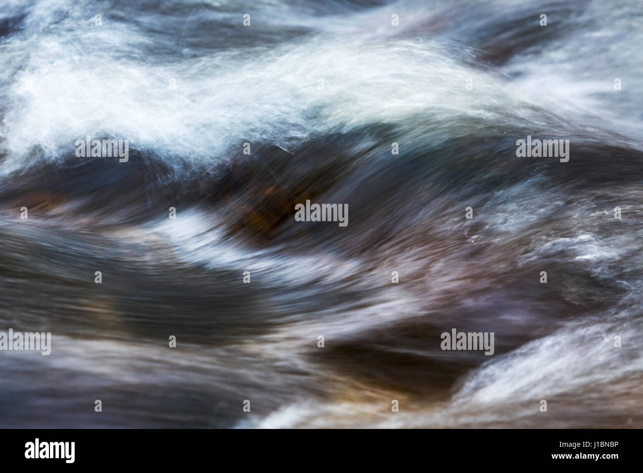 Flowing Water in a River Stock Photo - Alamy