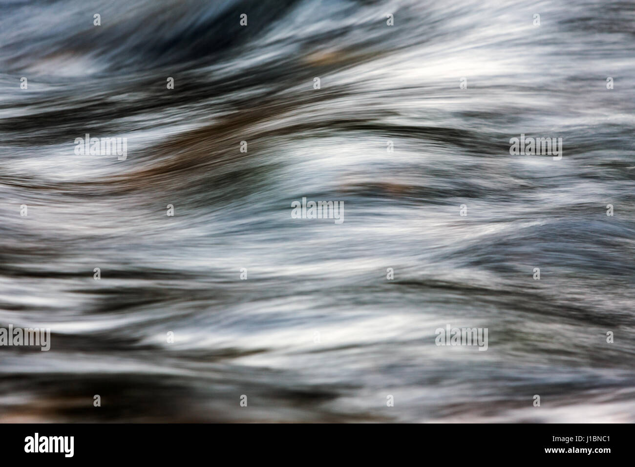Flowing Water in a River Stock Photo - Alamy