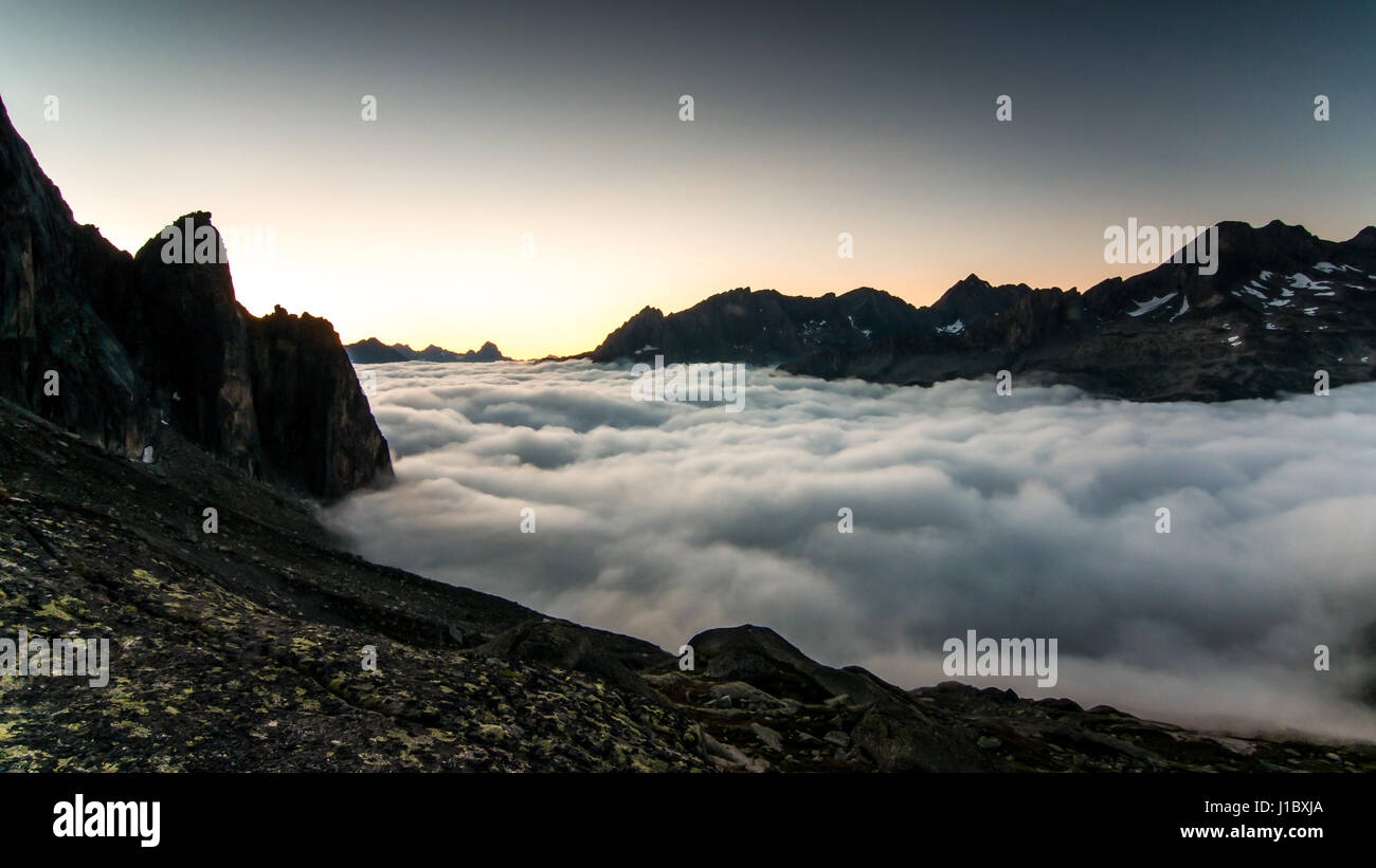 Cloud river in mountains Stock Photo - Alamy