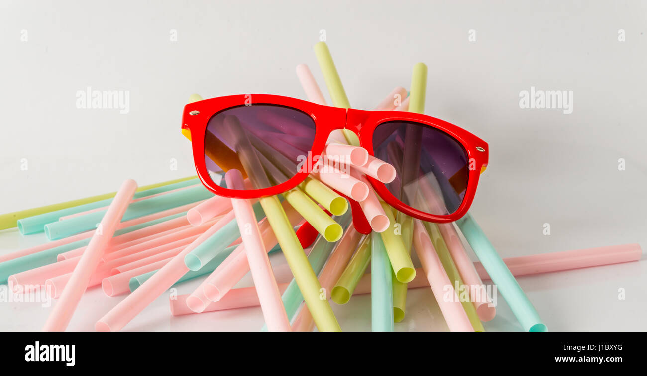 color straw drink and sunglasses, straw object of drink, white ...