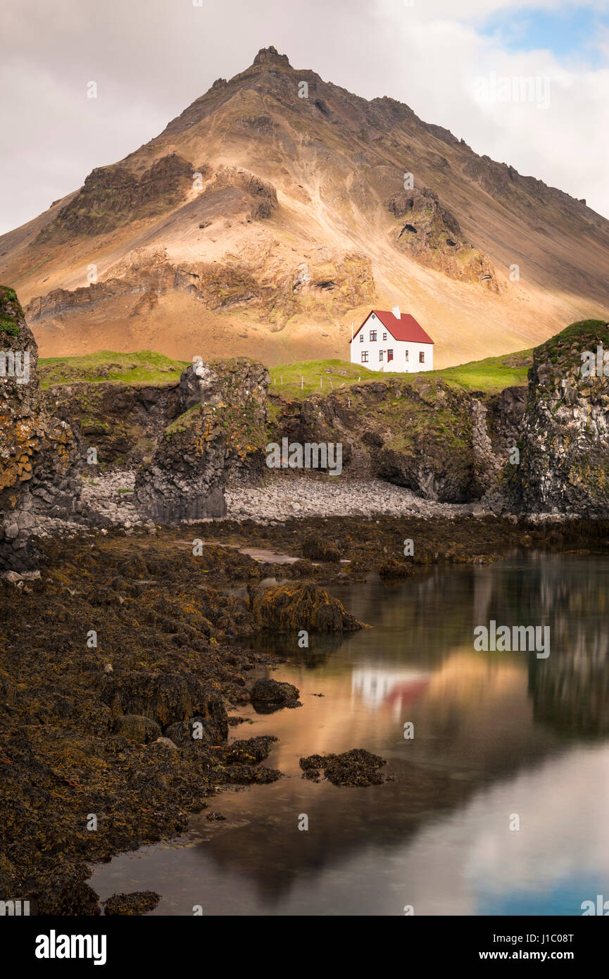 Arnarstapi, Icelandic fishing village, oceanside white remote isolated ...