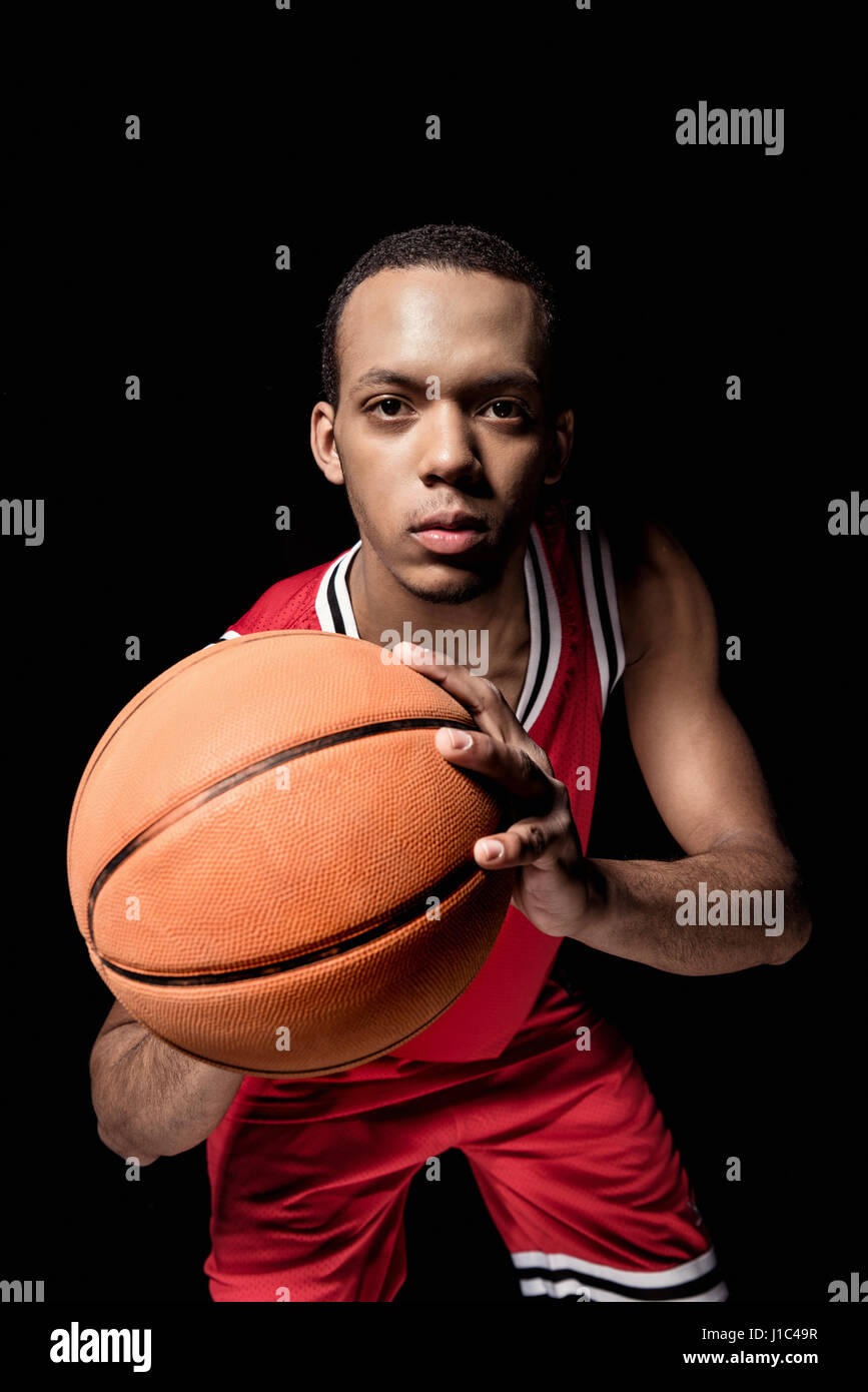 Playing basketball young man in hi-res stock photography and images - Alamy