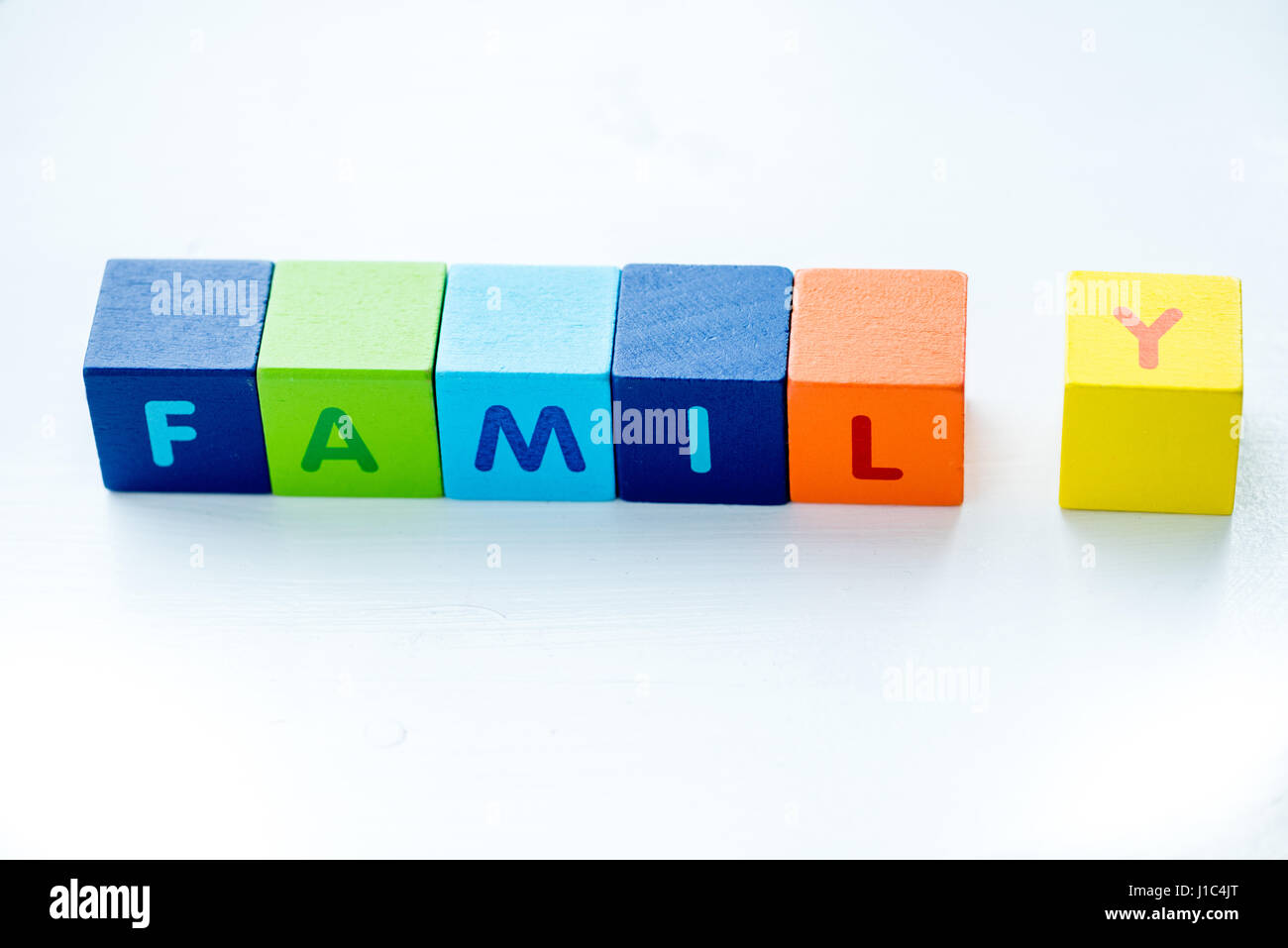Colorful cubes with letters consists the word family on white Stock ...