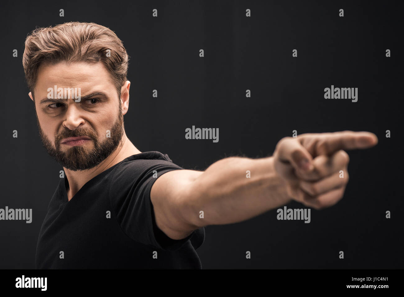 Black man pointing on side hi-res stock photography and images - Alamy