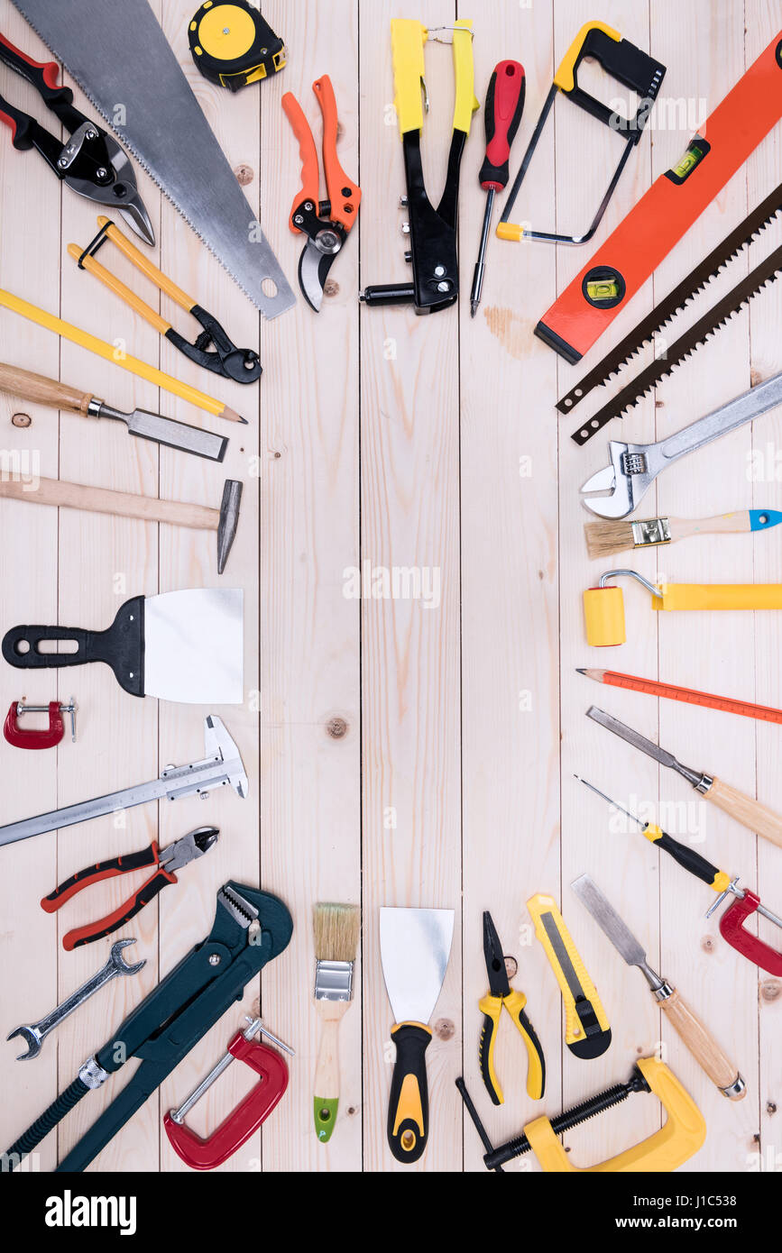 Top view of set of construction tools on wooden table Stock Photo - Alamy
