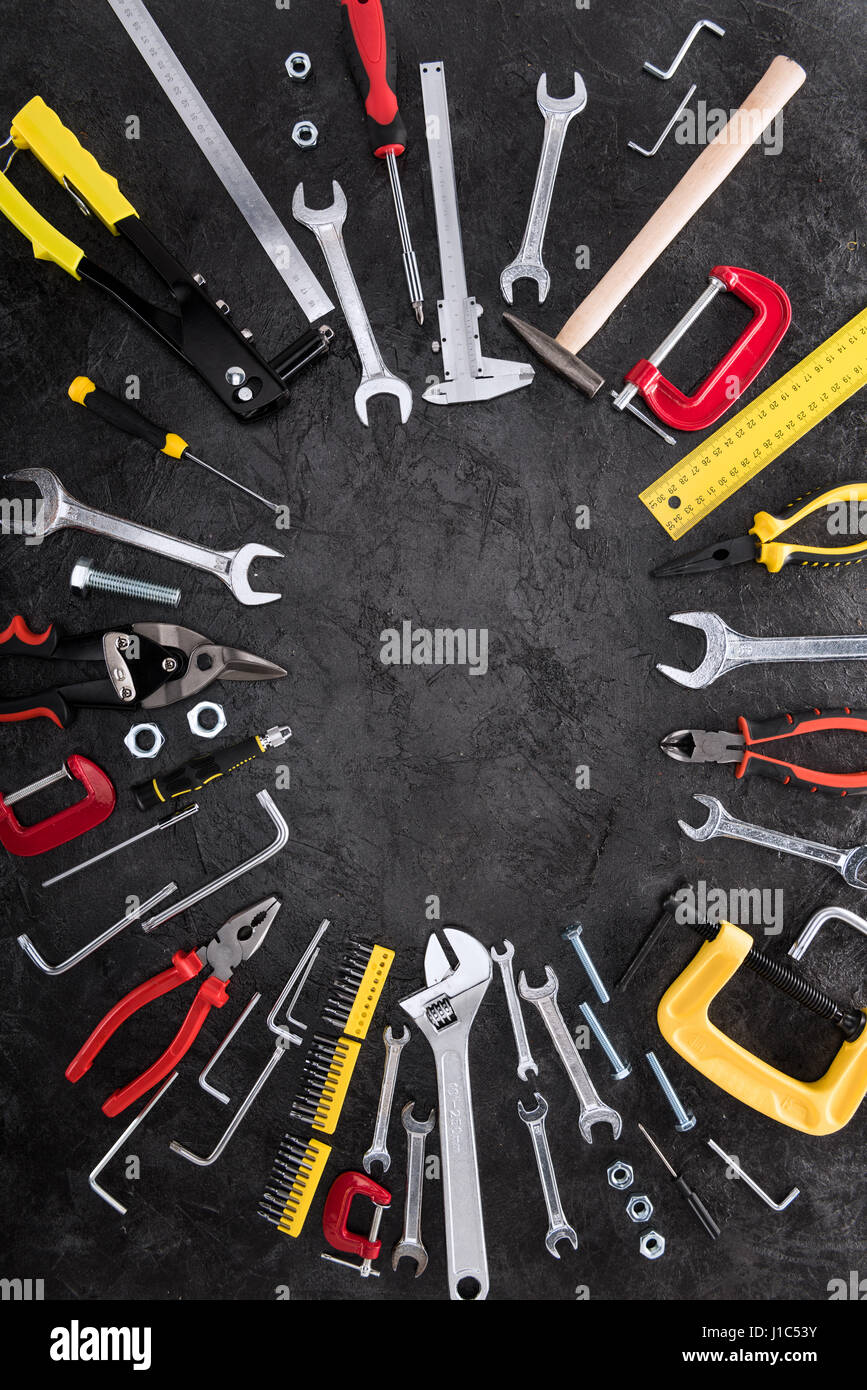 Top view of set of construction tools on black background Stock Photo ...