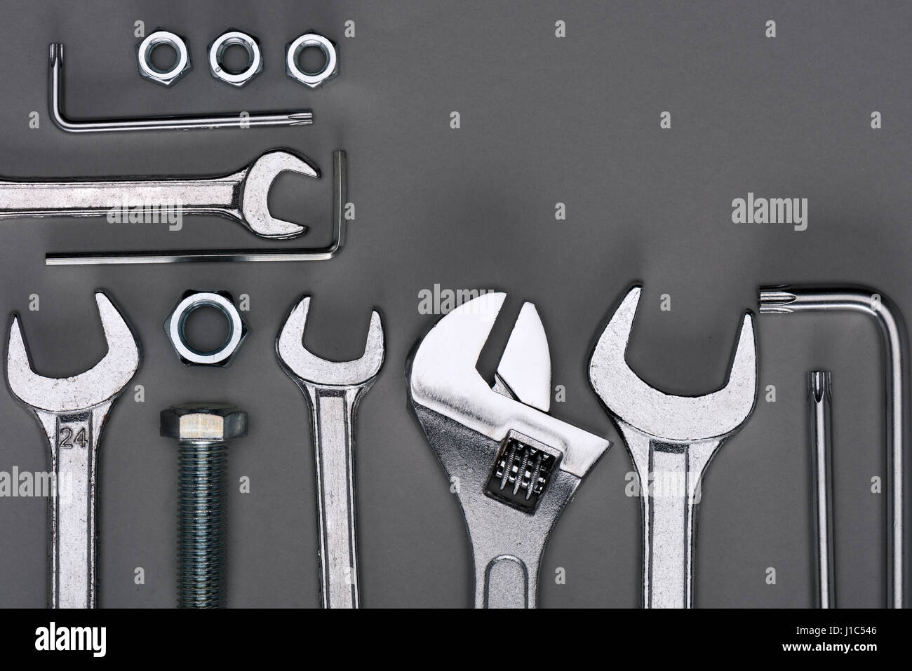 top view of set of various work tools on grey Stock Photo - Alamy