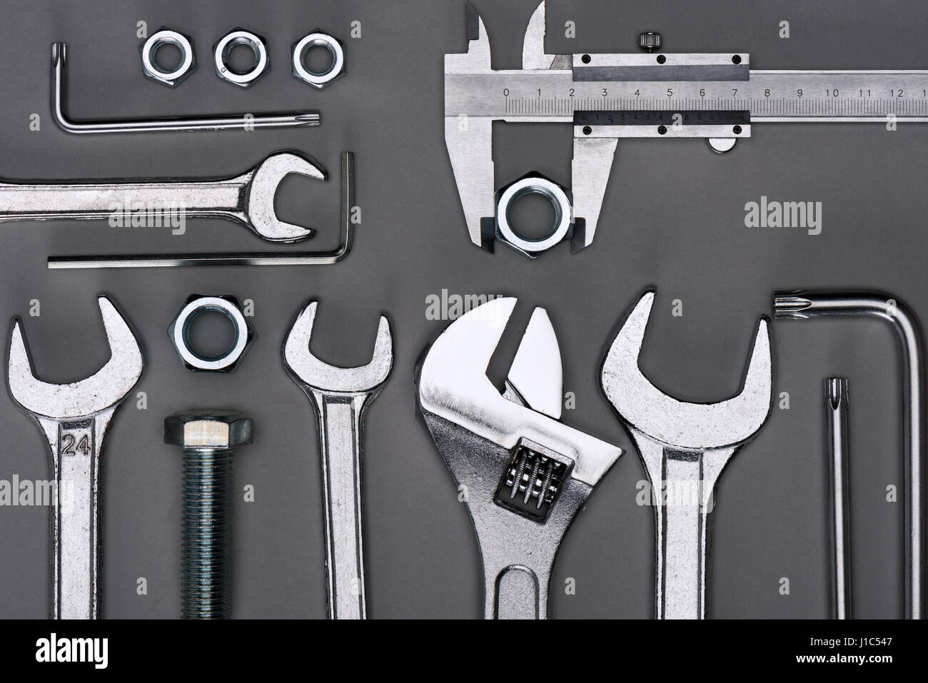 top view of set of various work tools on grey Stock Photo - Alamy