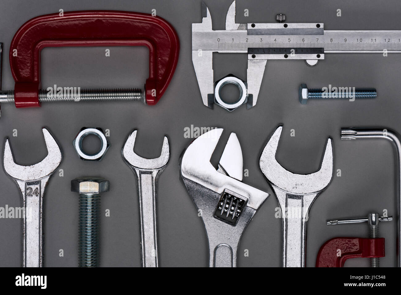 top view of set of various work tools on grey Stock Photo - Alamy