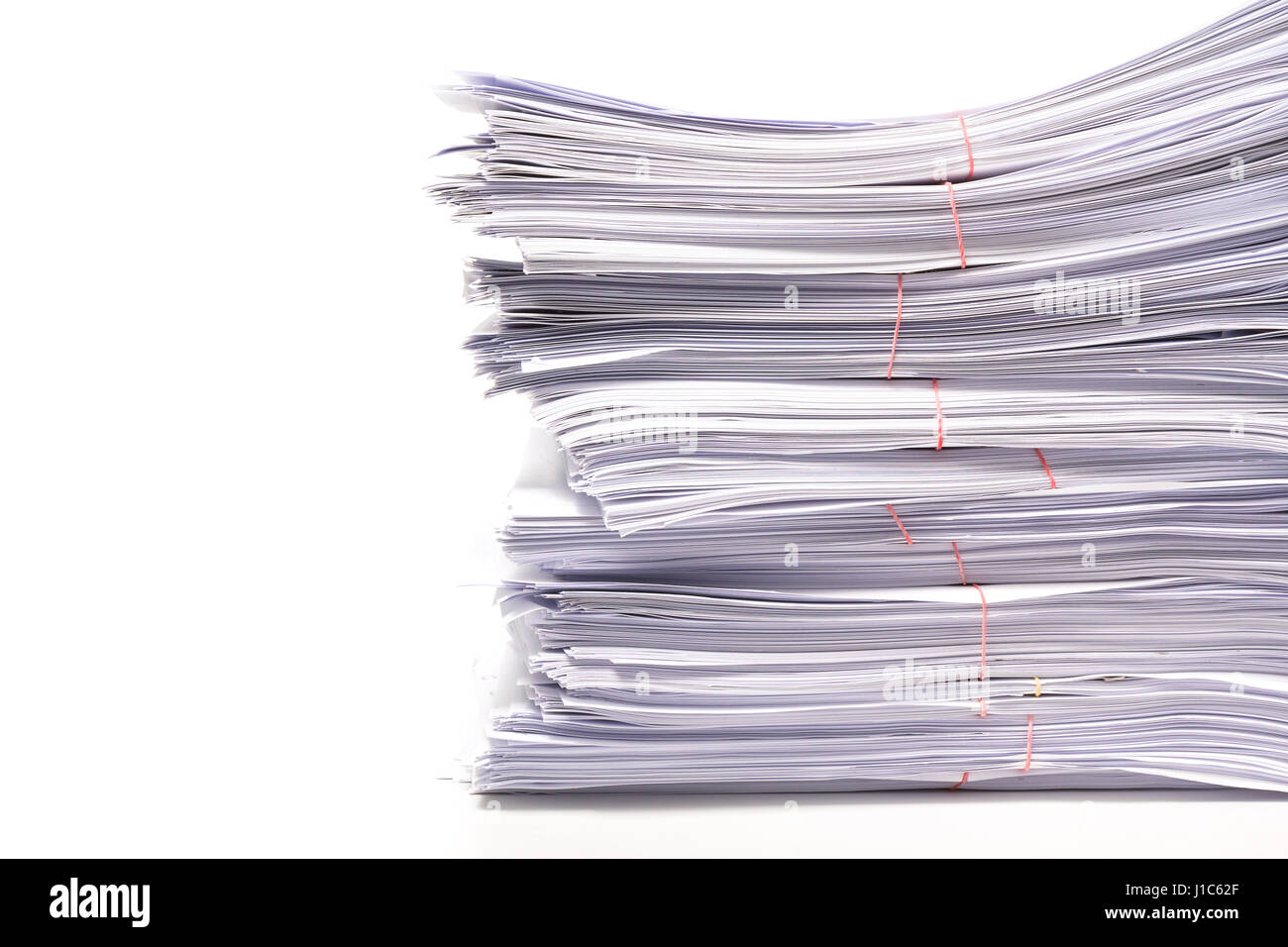Stack of business papers isolated on white background Stock Photo - Alamy