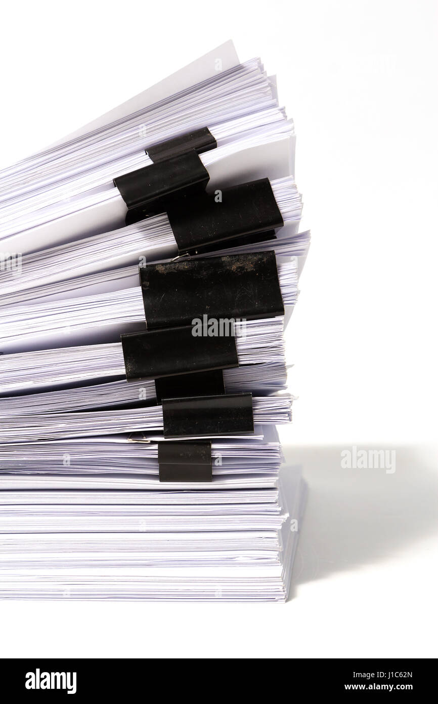 Stack of business papers isolated on white background Stock Photo - Alamy