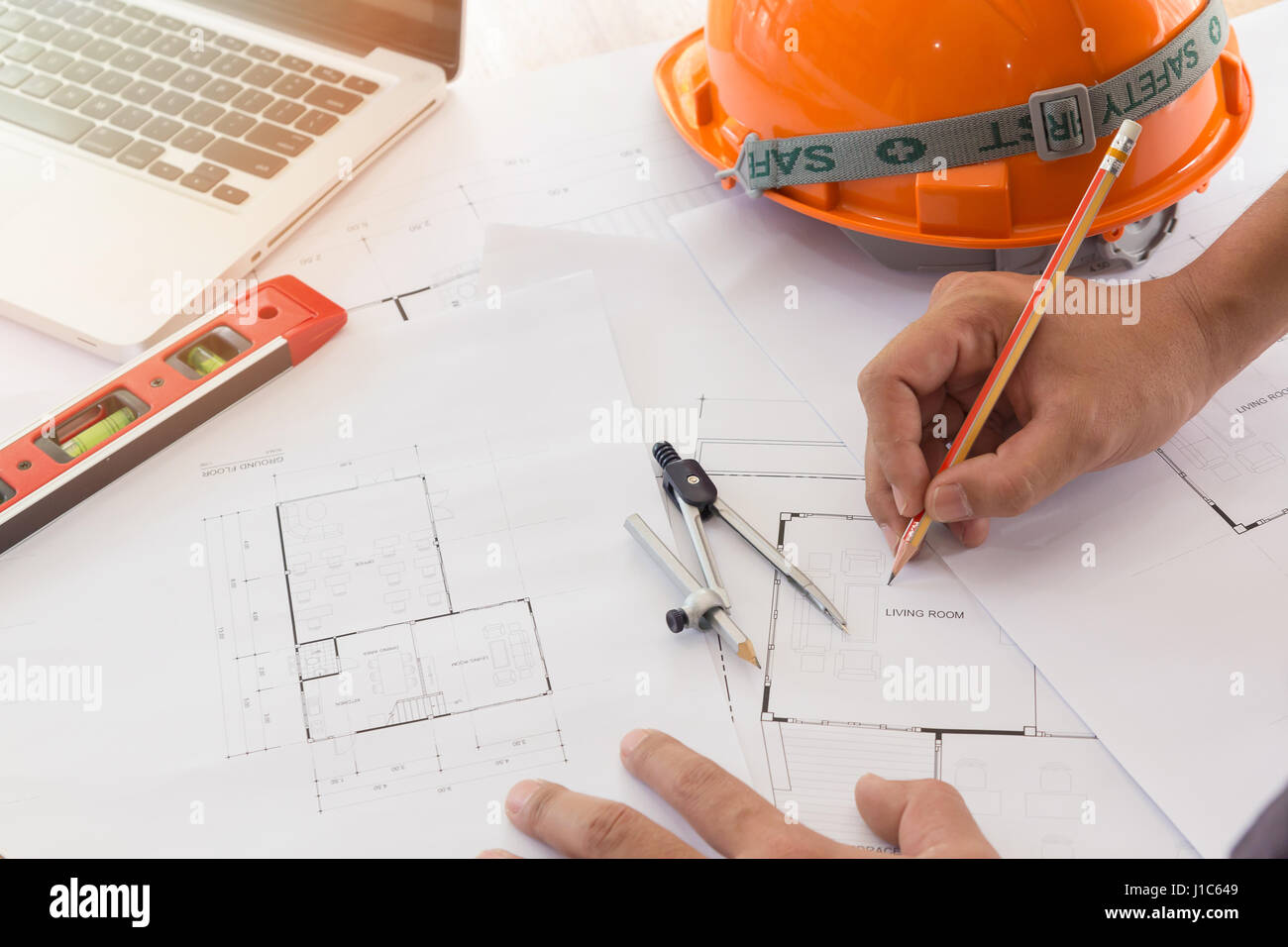Architect concept, Architects working with blueprints in the office ...