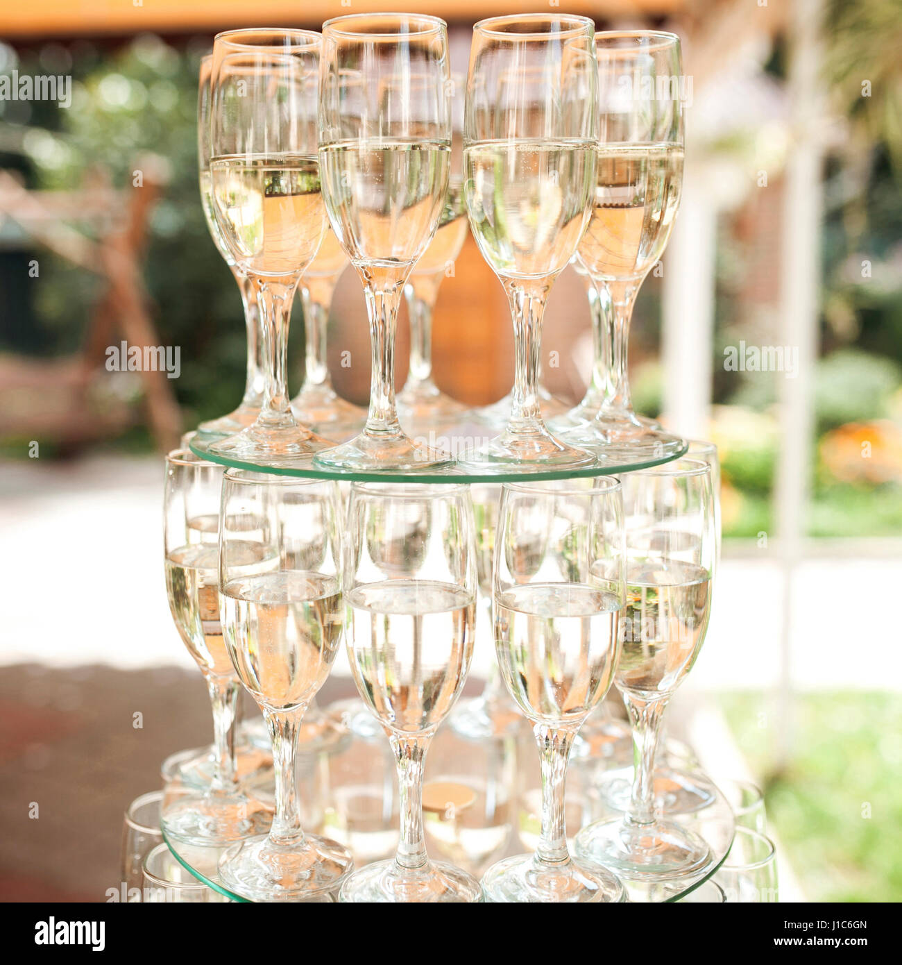 Stack of champagne in champagne flutes Stock Photo - Alamy