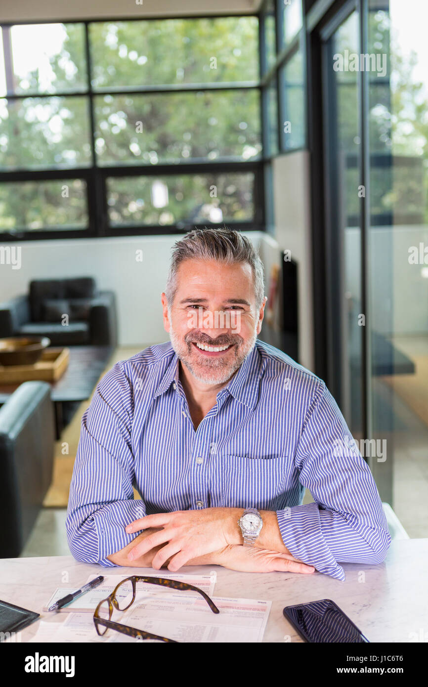 Sitting business man table hi-res stock photography and images - Alamy