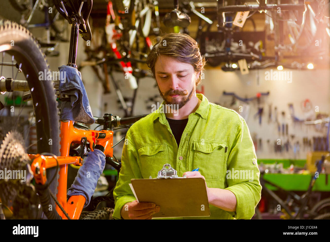 Worker writing hi-res stock photography and images - Alamy