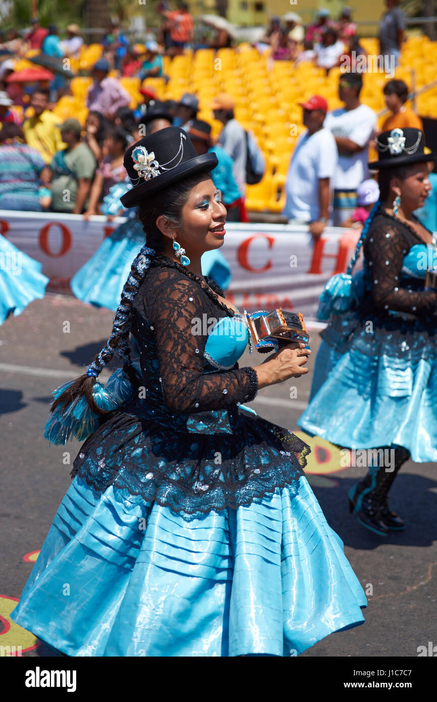 Morenada dancers in traditional Andean costume performing at the annual ...
