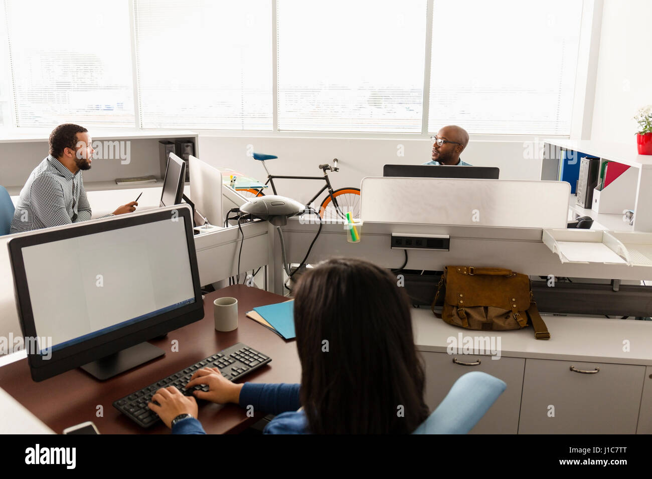 People working at computers in office Stock Photo - Alamy