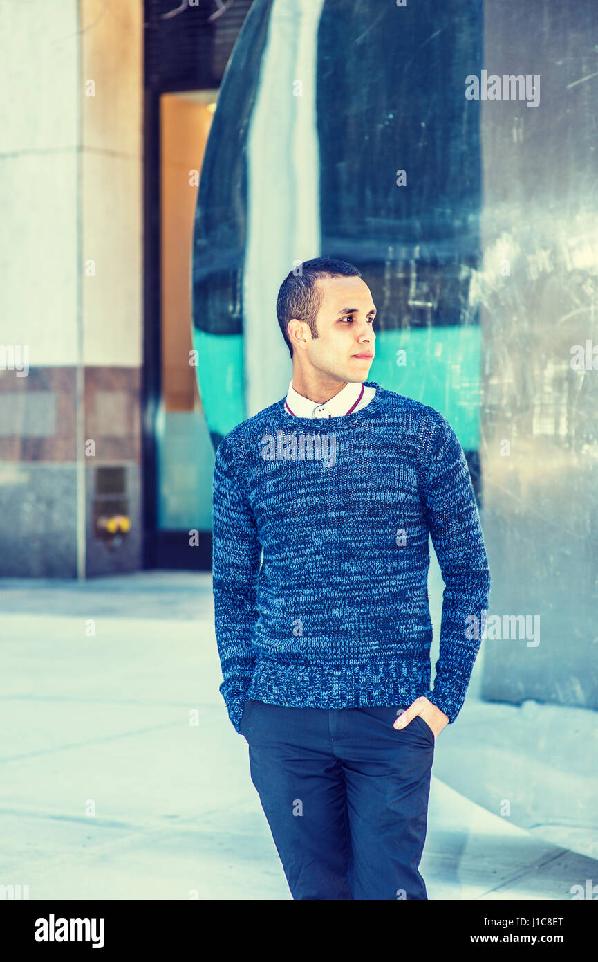 Person wearing blue sweater hi-res stock photography and images - Alamy